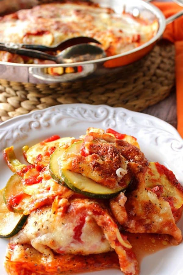 Layered Zucchini Parmesan Recipe with Bell Peppers and Onions